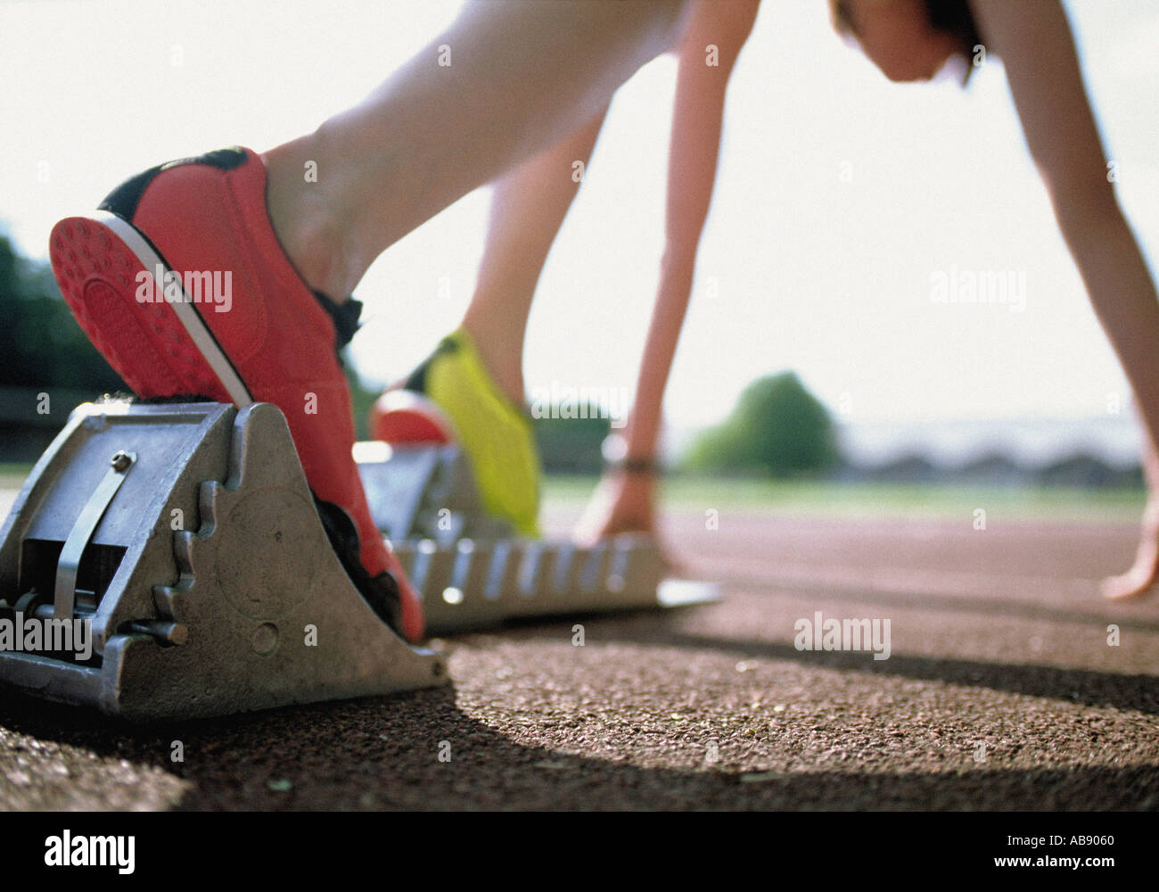 Runner on starting blocks hi-res stock photography and images - Alamy