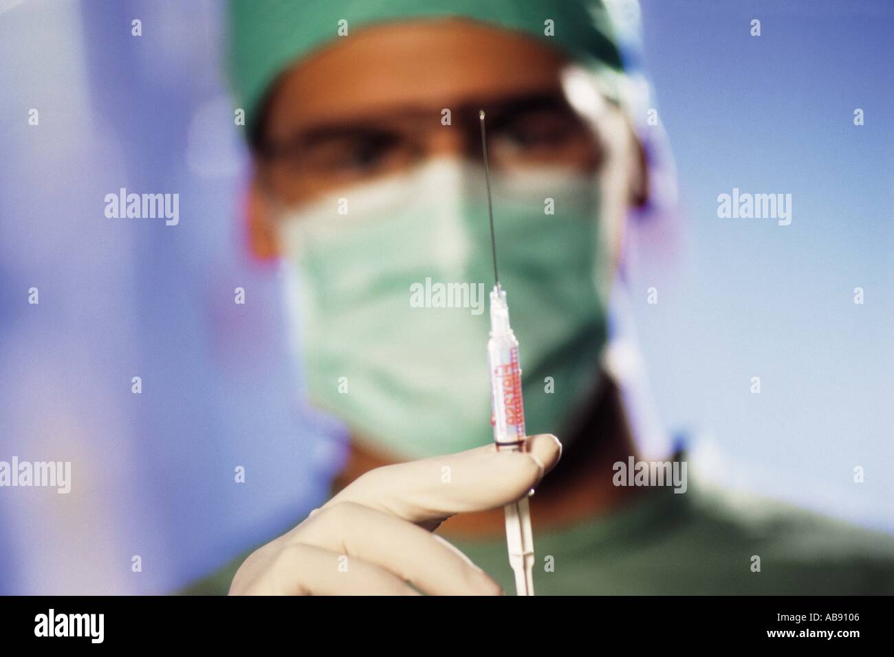 Male plastic surgeon injecting hi-res stock photography and images - Alamy