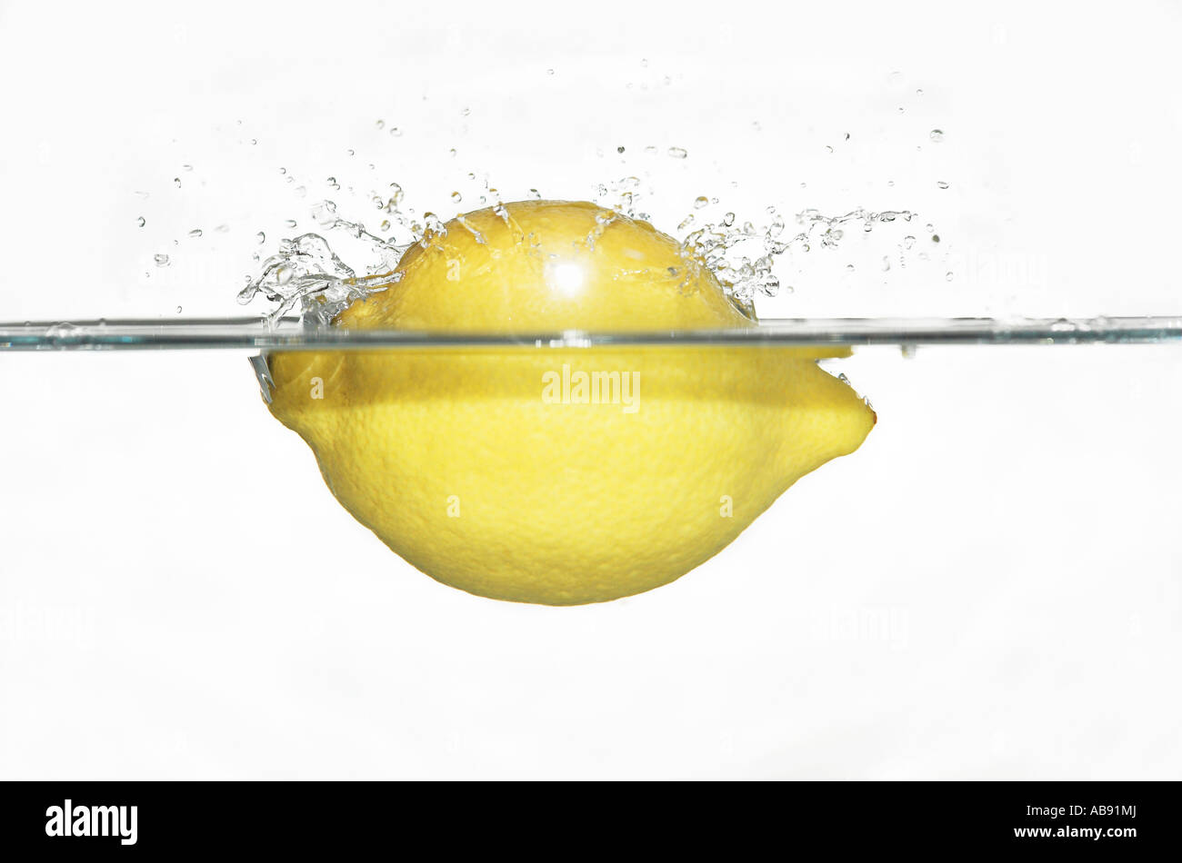 Fresh lemons water splash Cut Out Stock Images & Pictures - Alamy