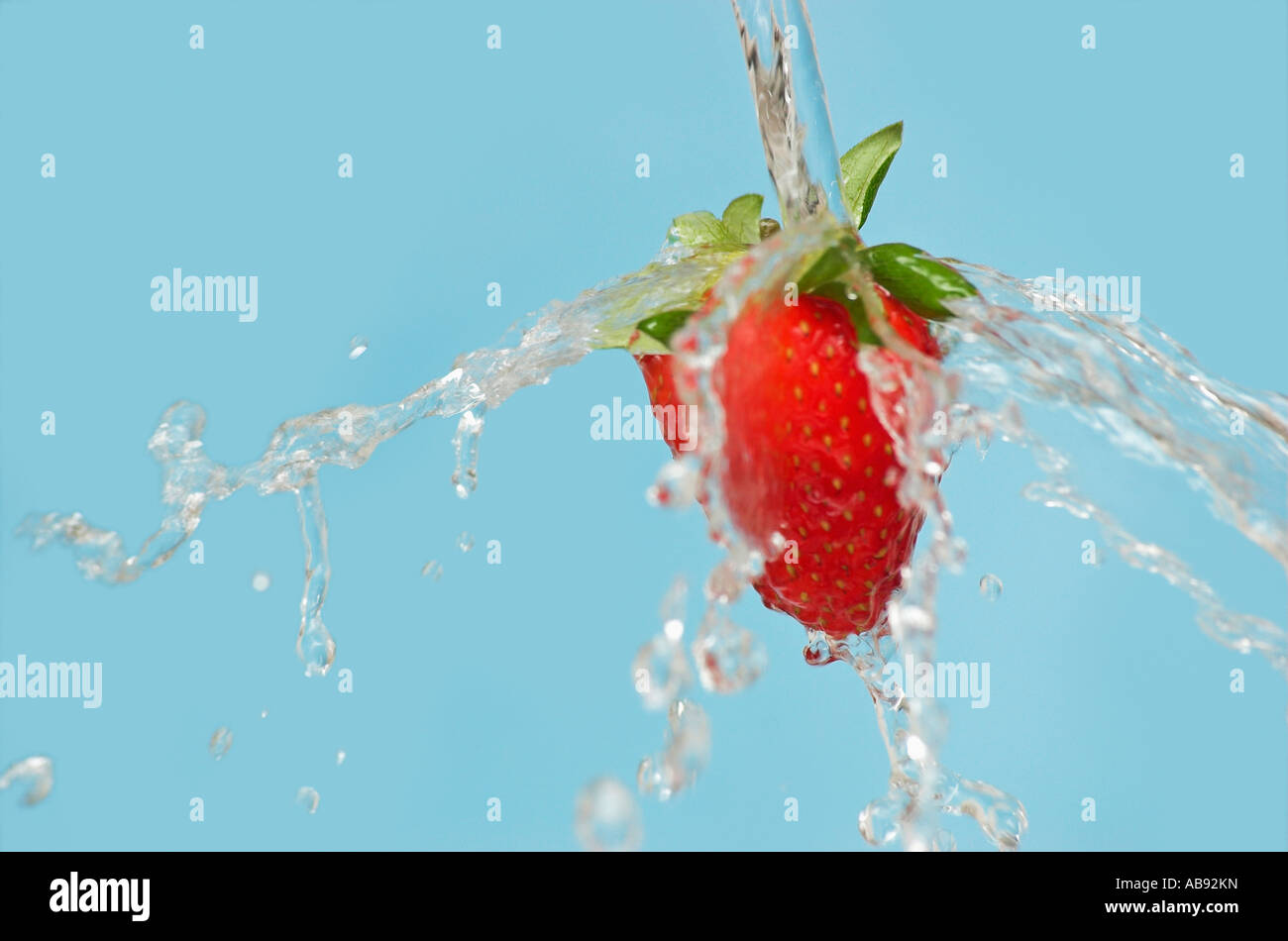 Water splashing on strawberry Stock Photo - Alamy