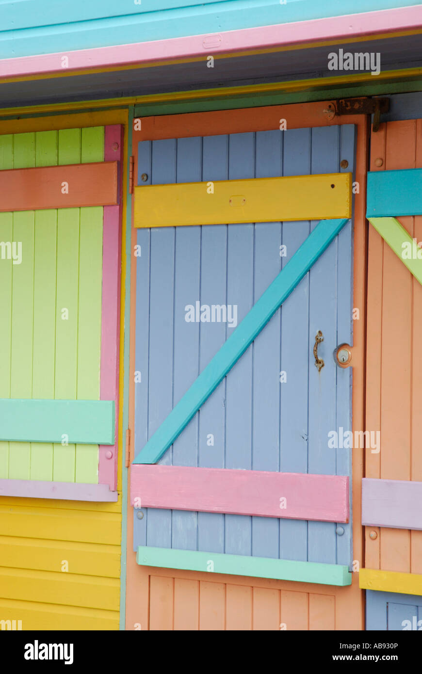 Close up of bright multi pastel coloured beach hut Whitstable Kent ...