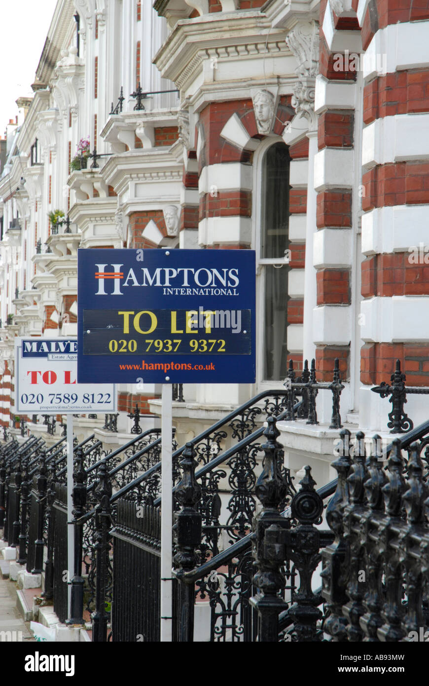 Estate agent 'To Let' signs outside ornate terraced houses in ...
