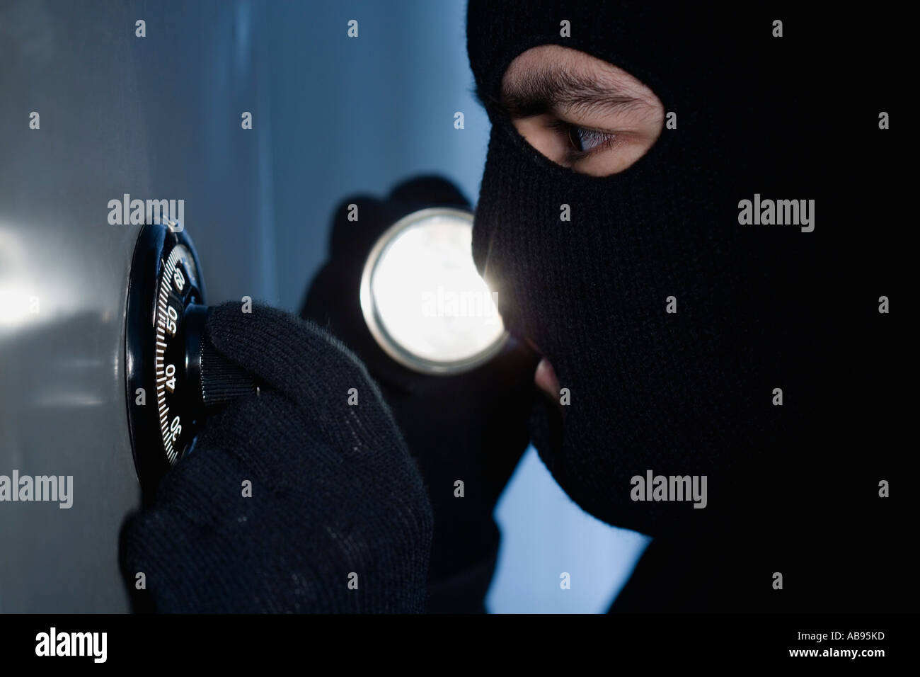 Thief unlocking a combination lock Stock Photo - Alamy Thief unlocking a combination lock Stock Photo - Alamy