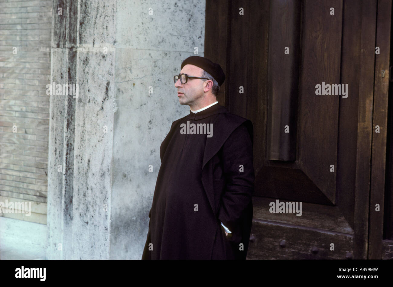 St. Peters Vatican square Rome Italy Italian priest in doorway Stock ...