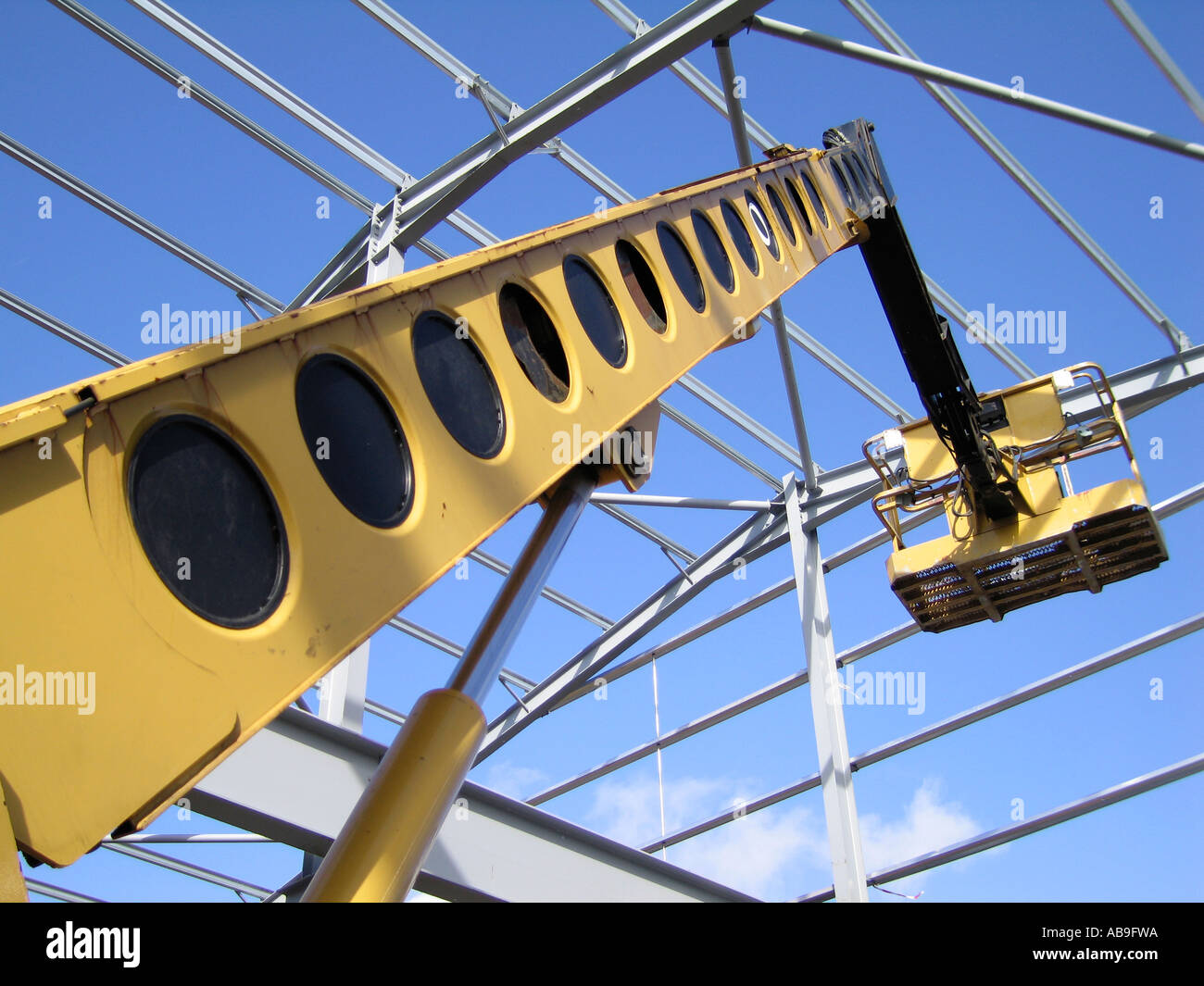 Steel portal frame building during construction with access hoist Stock ...