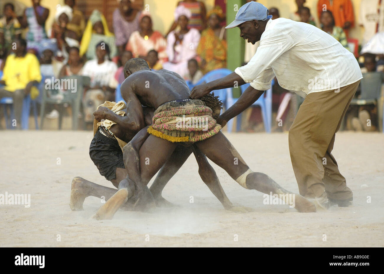 wrestling match at Abn festival, fighters with referee, Senegal ...