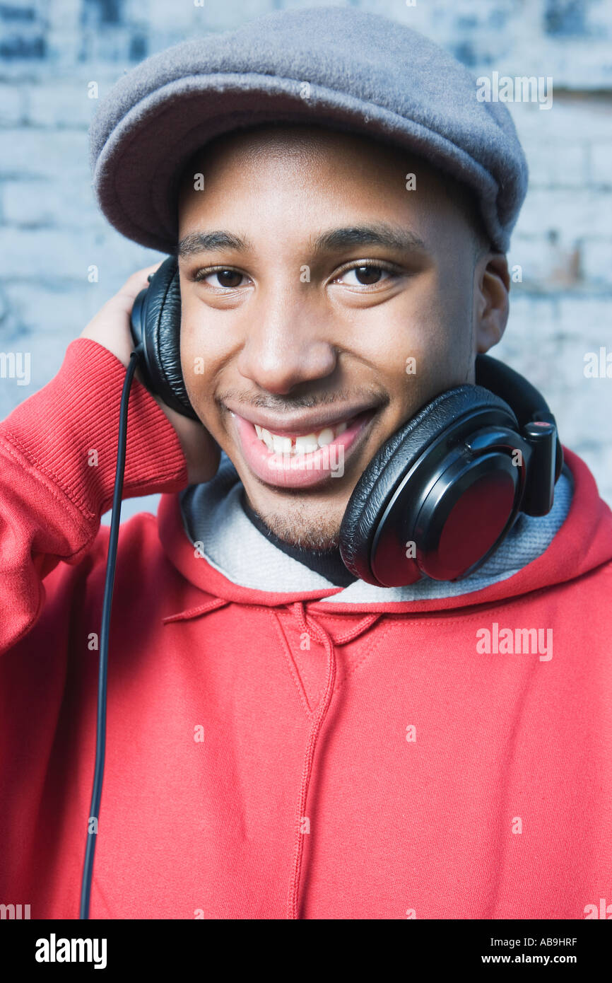 Teenage boy wearing headphones Stock Photo - Alamy