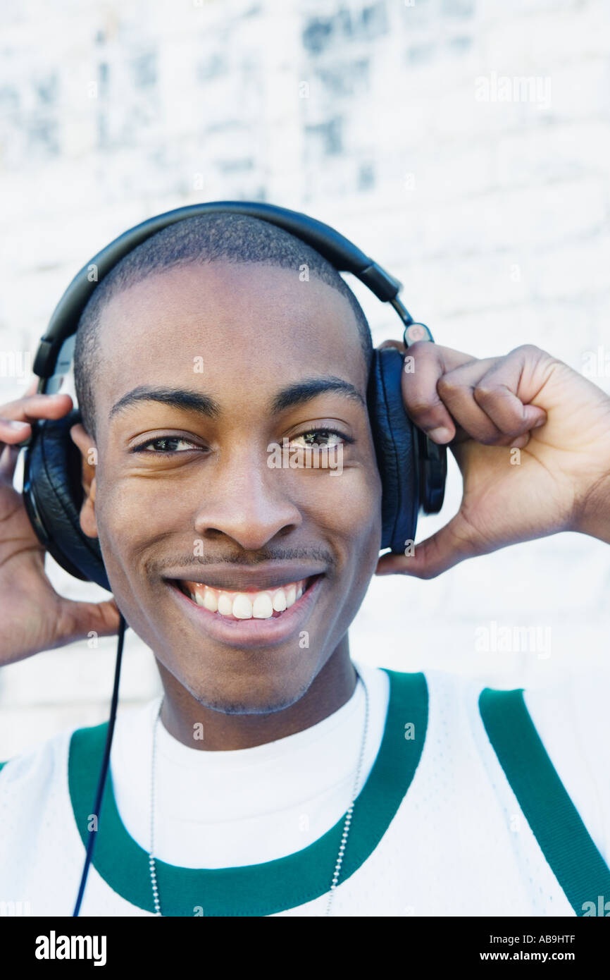 Teenage boy wearing headphones Stock Photo - Alamy