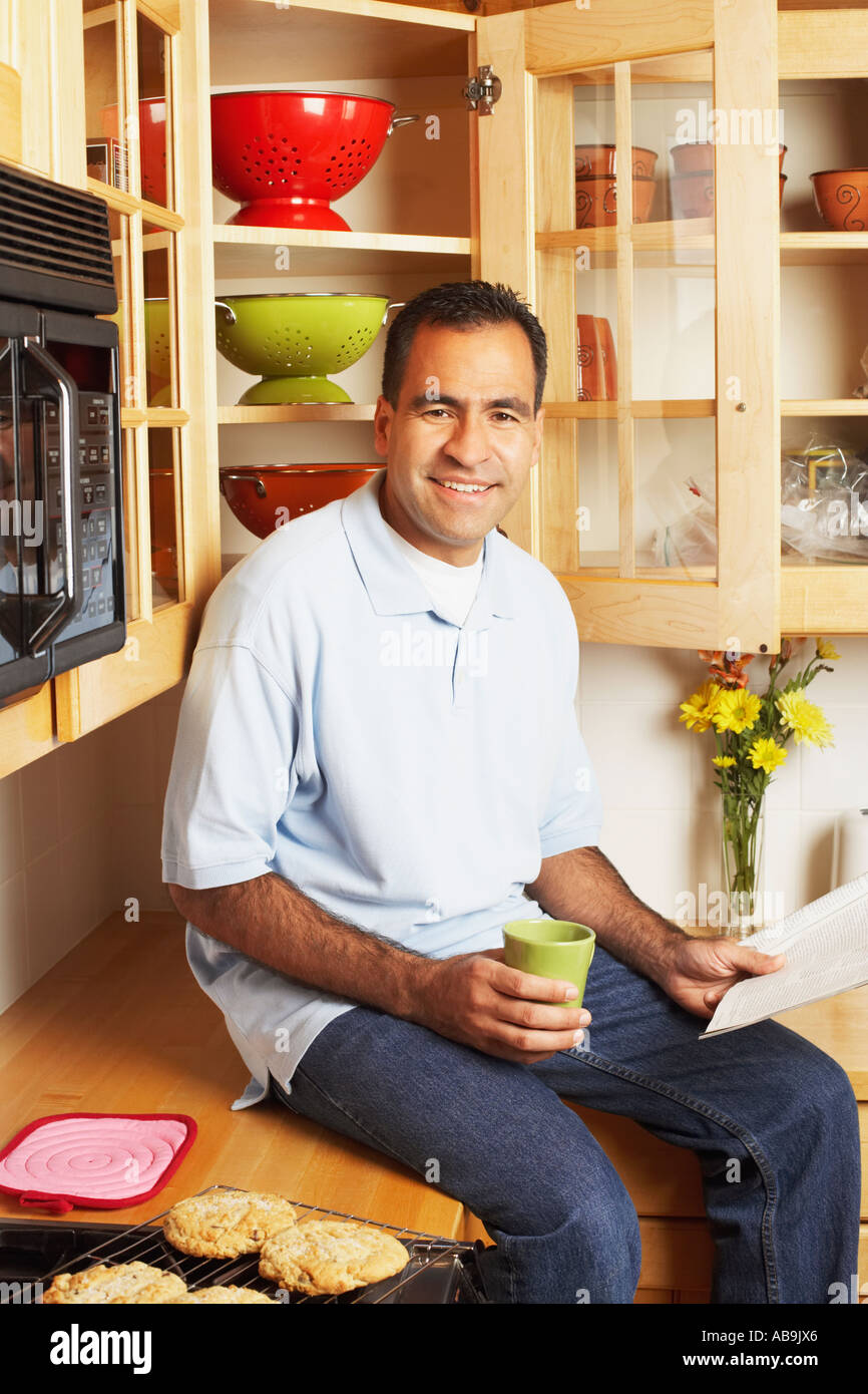 Man sitting at counter hi-res stock photography and images - Alamy