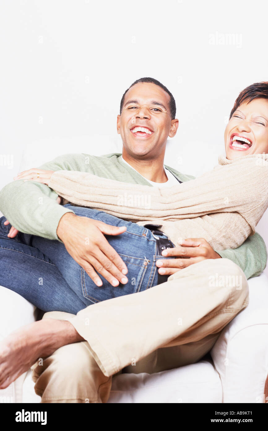 Man holding girlfriend on lap hi-res stock photography and images - Alamy