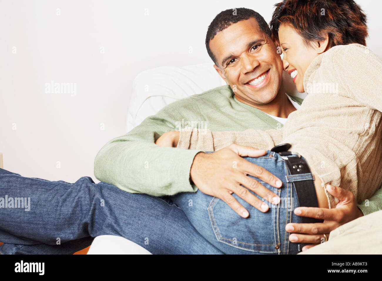 Man holding girlfriend on lap hi-res stock photography and images - Alamy