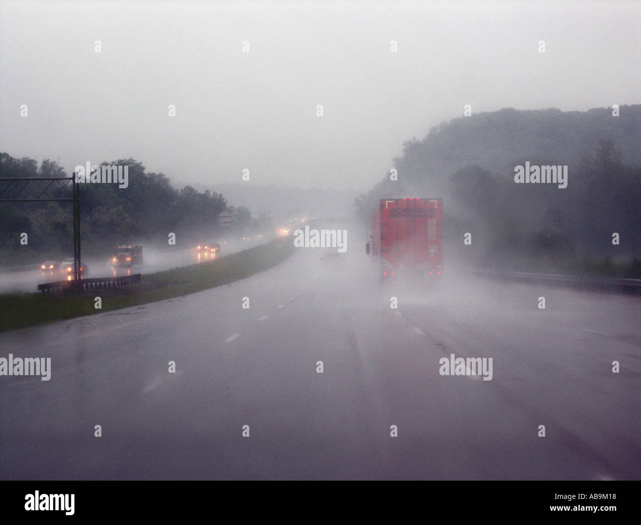 Traffic rainy day cars trucks hi-res stock photography and images - Alamy