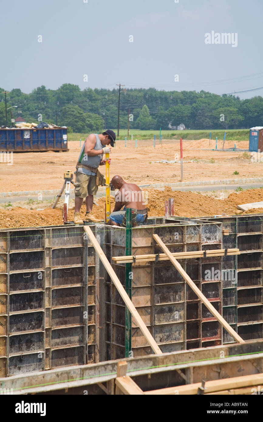 Immigrant Workers on a Residential Construction Site Stock Photo - Alamy