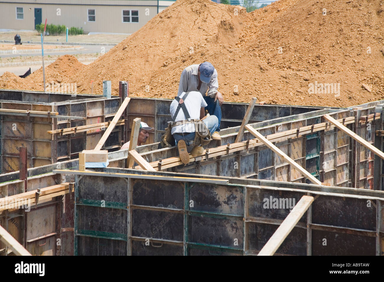 Immigrant Workers on a Residential Construction Site Stock Photo - Alamy