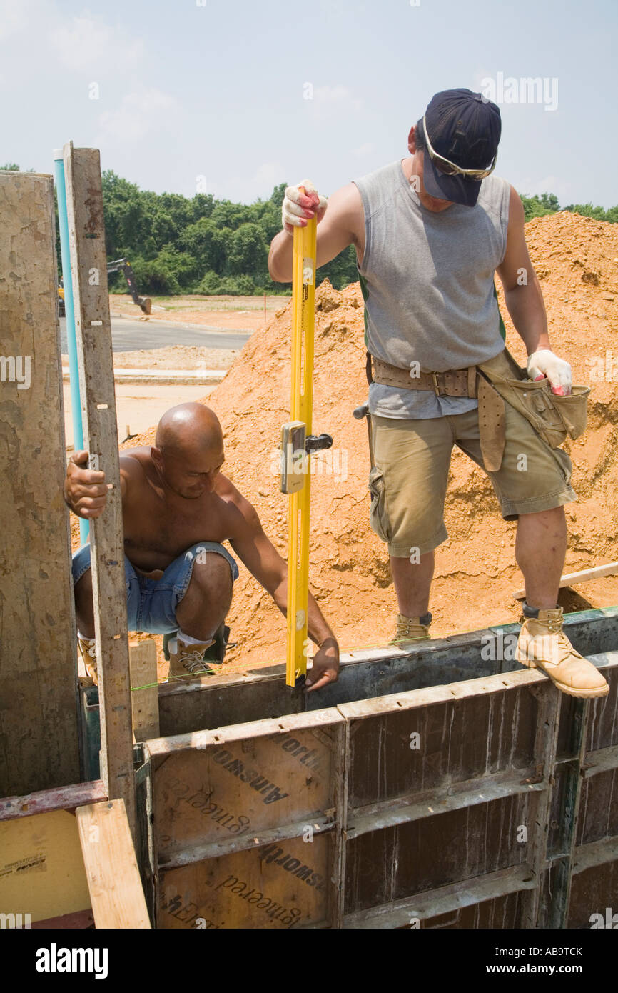 Immigrant Workers on a Residential Construction Site Stock Photo - Alamy