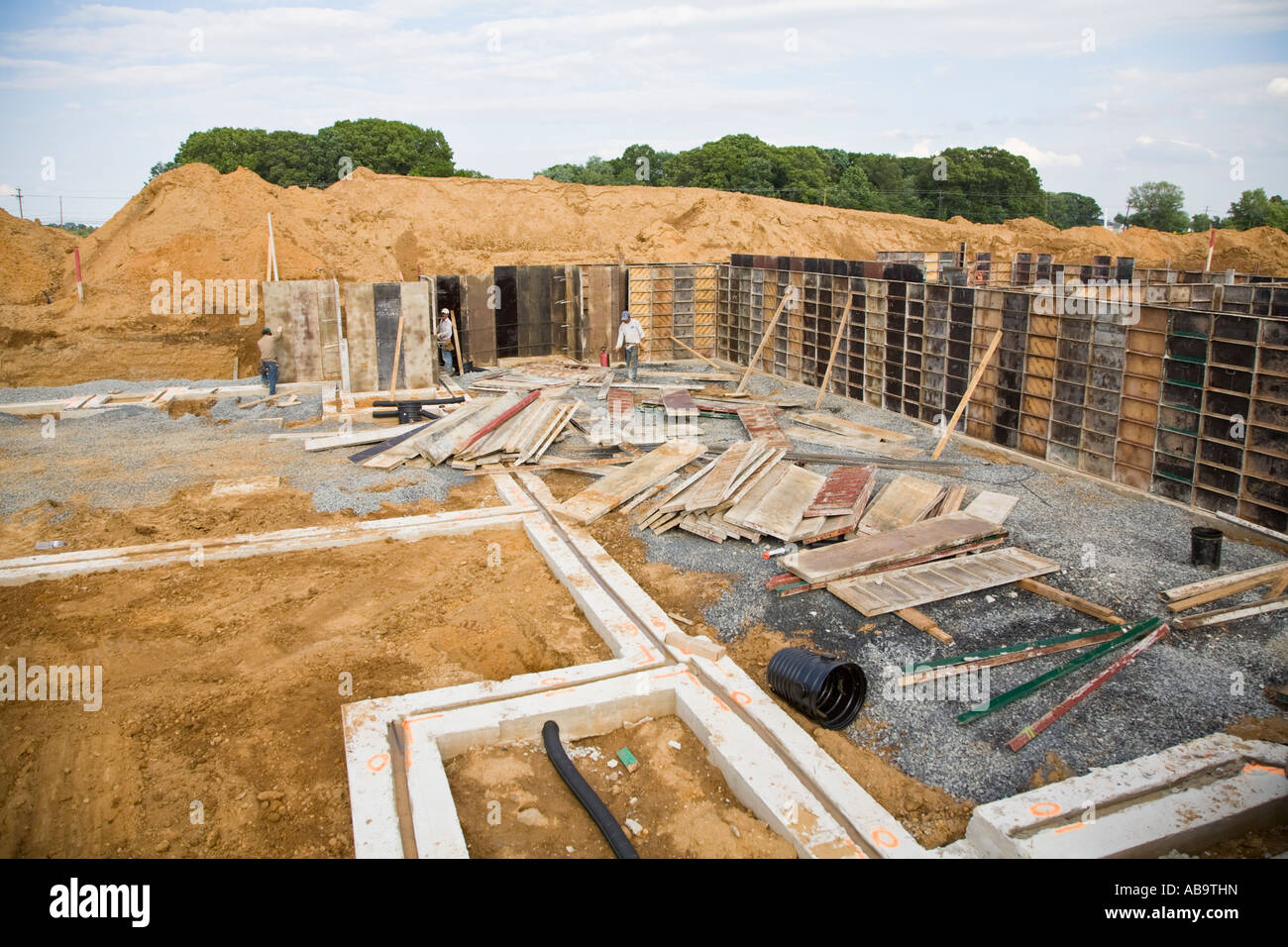 Immigrant Workers on a Commercial Office Complex Construction Site ...