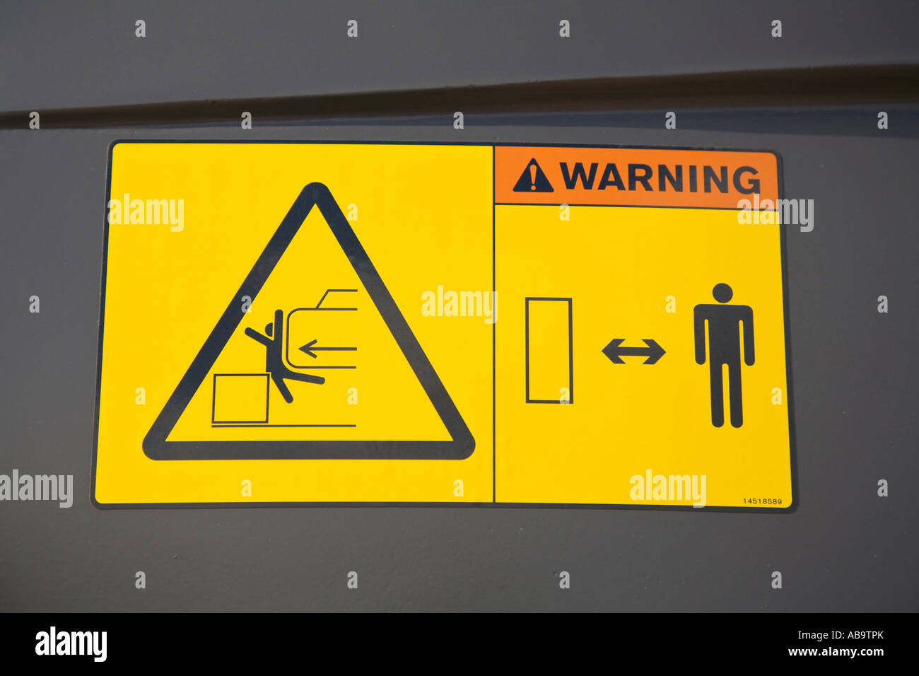 Warning Sign on Crawler Excavators Stock Photo - Alamy