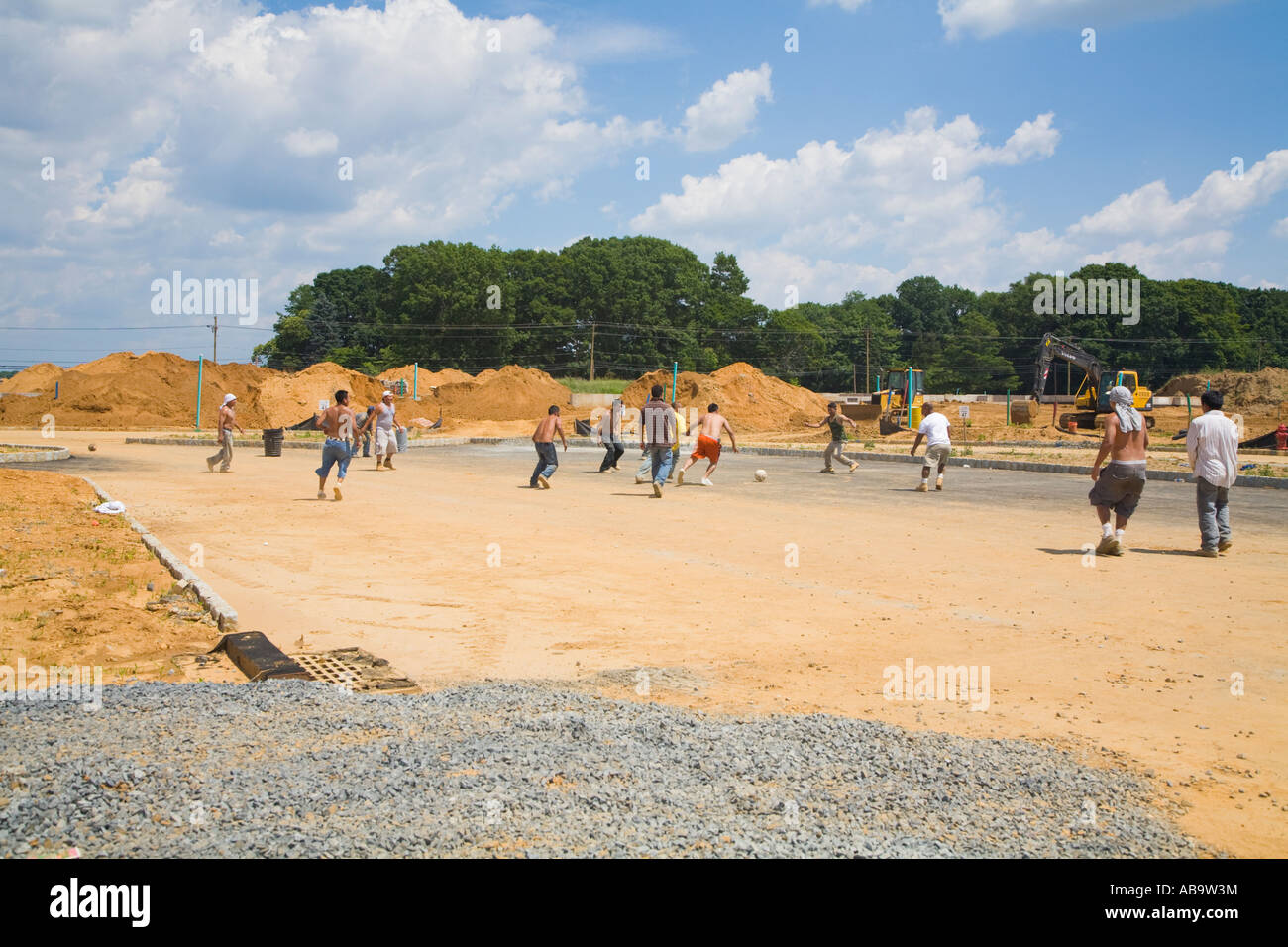 Immigrant Workers Playing Soccer during Lunch Break on Construction ...