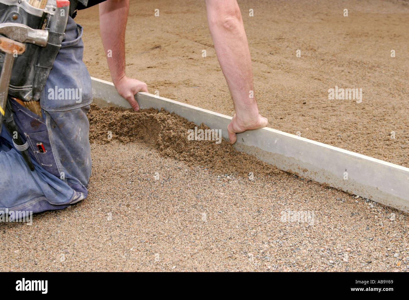Leveling the sand hi-res stock photography and images - Alamy