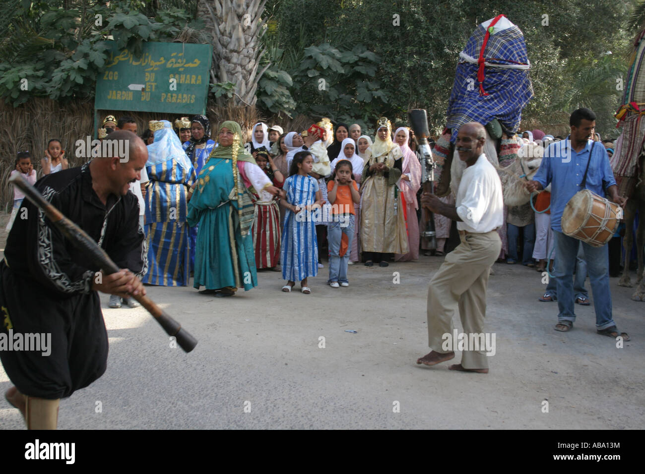 Acrobats dancing with guns during a wedding procession in Tozeur south ...