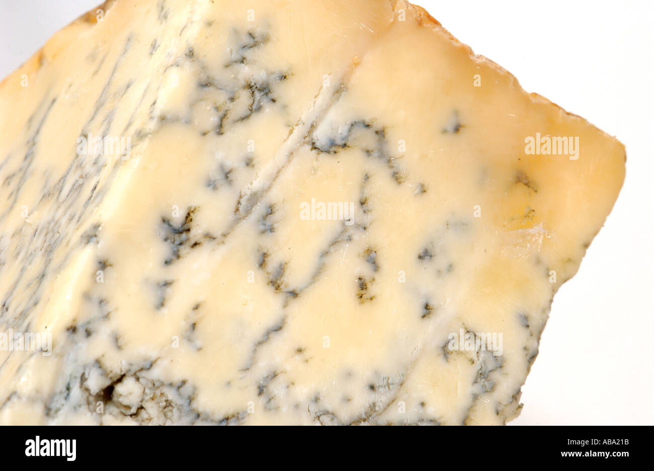 Close up of Wedge piece of stilton cheese Stock Photo - Alamy