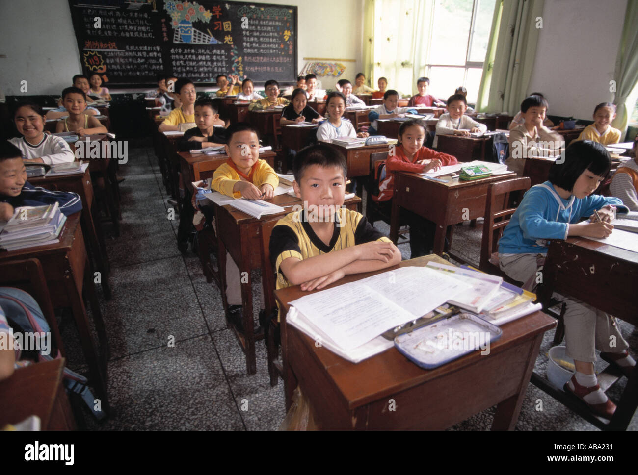 First grade children at their desks at an elementary school in ...