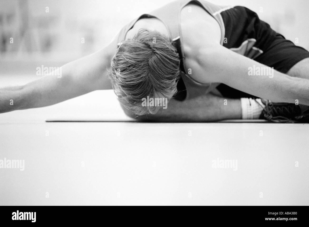Stretching person Black and White Stock Photos & Images - Alamy
