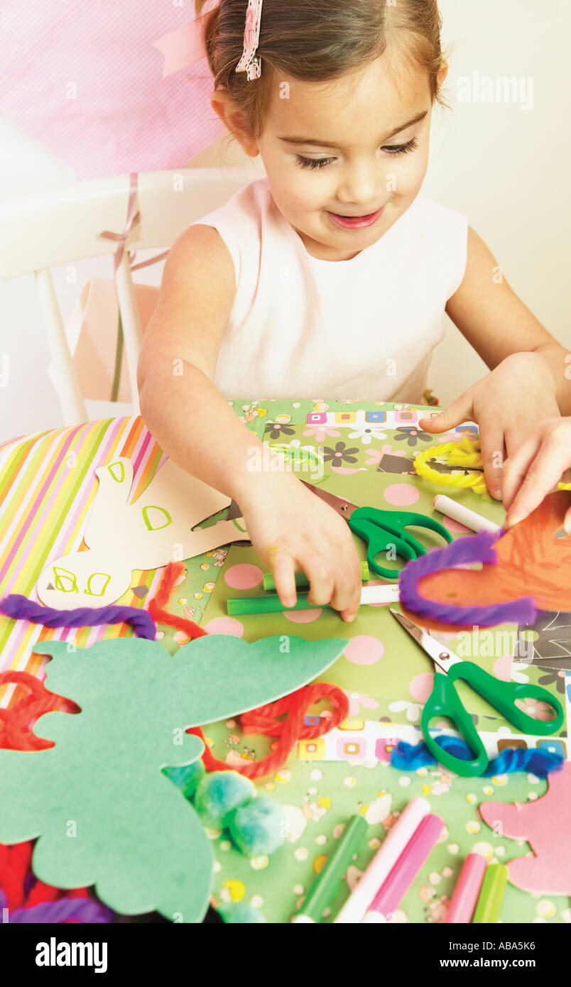 Young girl doing arts and crafts Stock Photo - Alamy