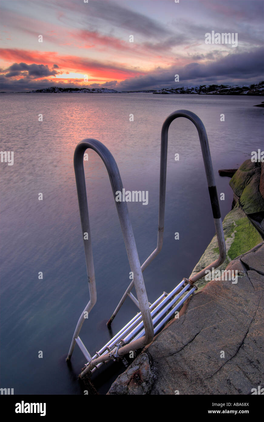 Bath ladder at sunset Stock Photo - Alamy