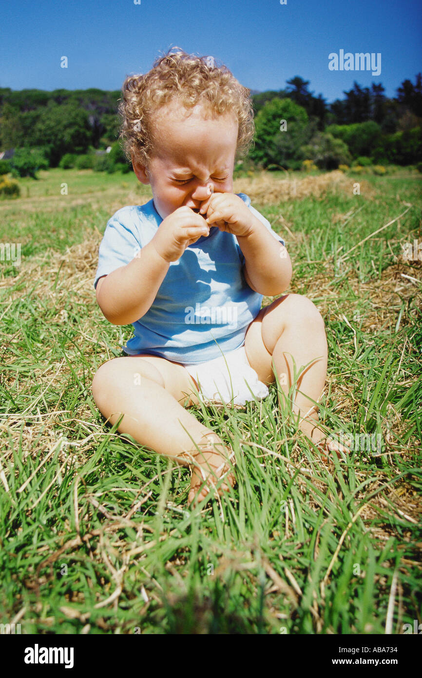 Baby crying alone hi-res stock photography and images - Alamy