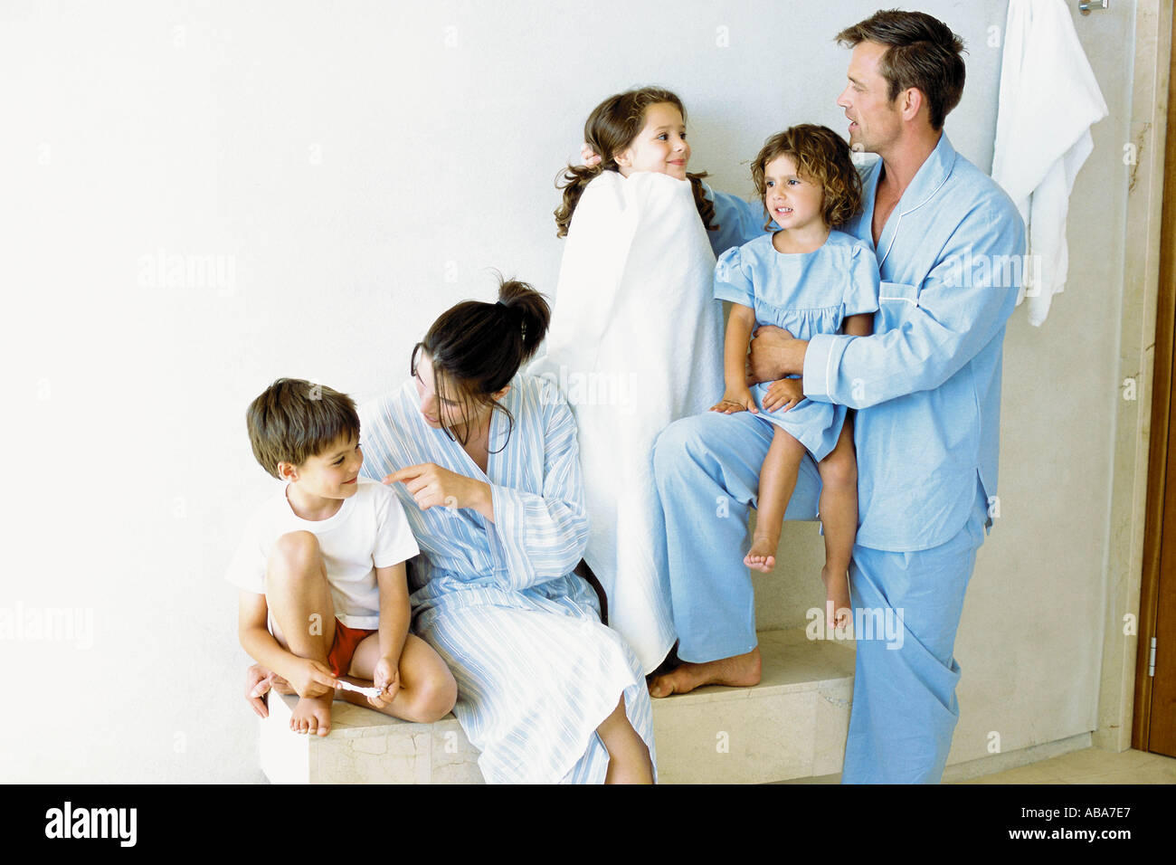 Family in the bathroom Stock Photo - Alamy