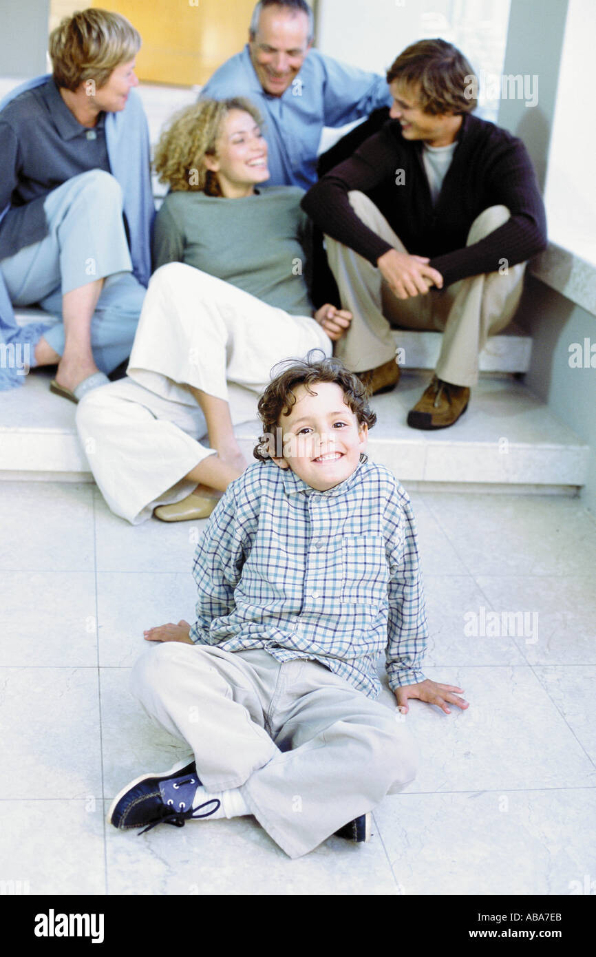 Boy with parents and grandparents Stock Photo - Alamy