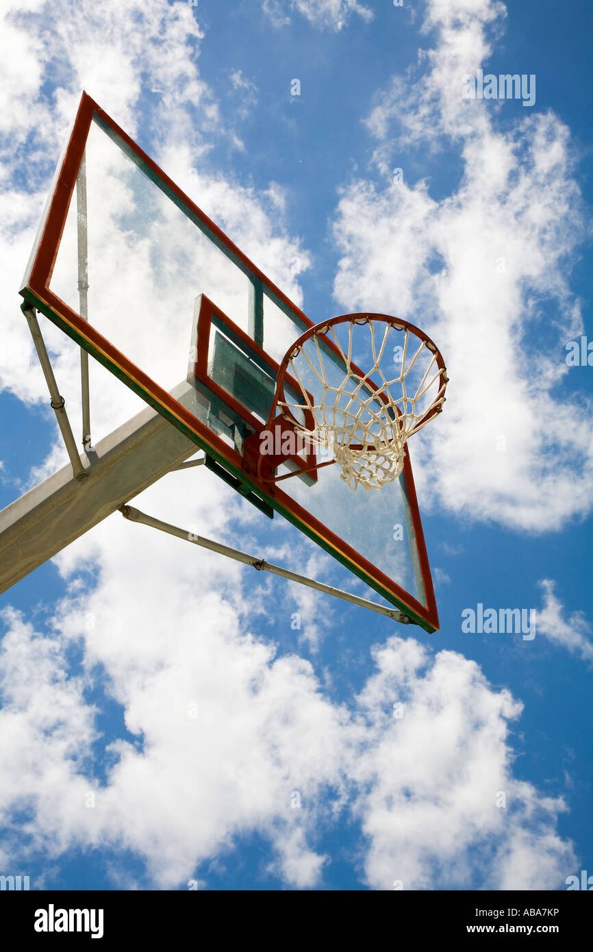 Basketball hoop and backboard against blue sky, low angle view Stock ...