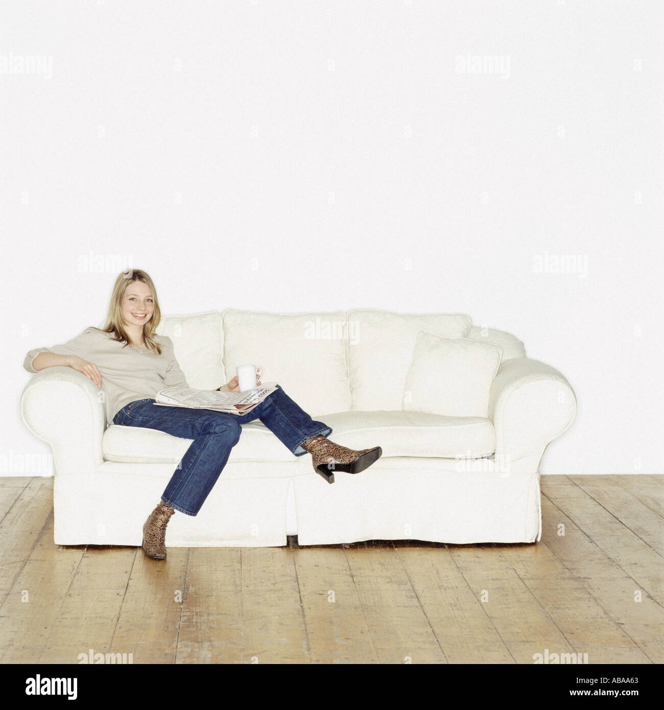 Woman relaxing at home Stock Photo - Alamy