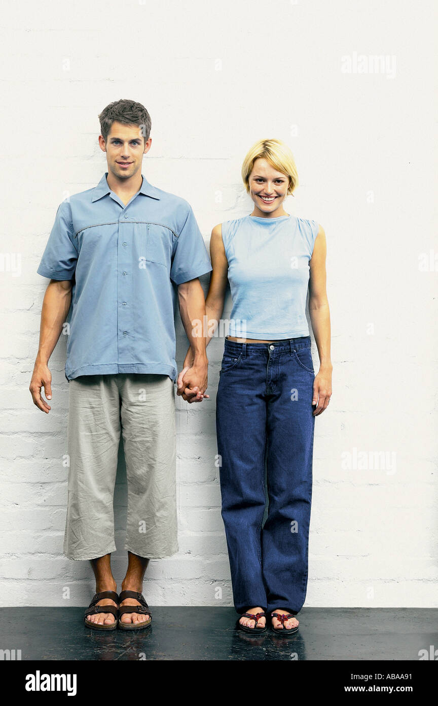 Couple standing together man hi-res stock photography and images - Alamy