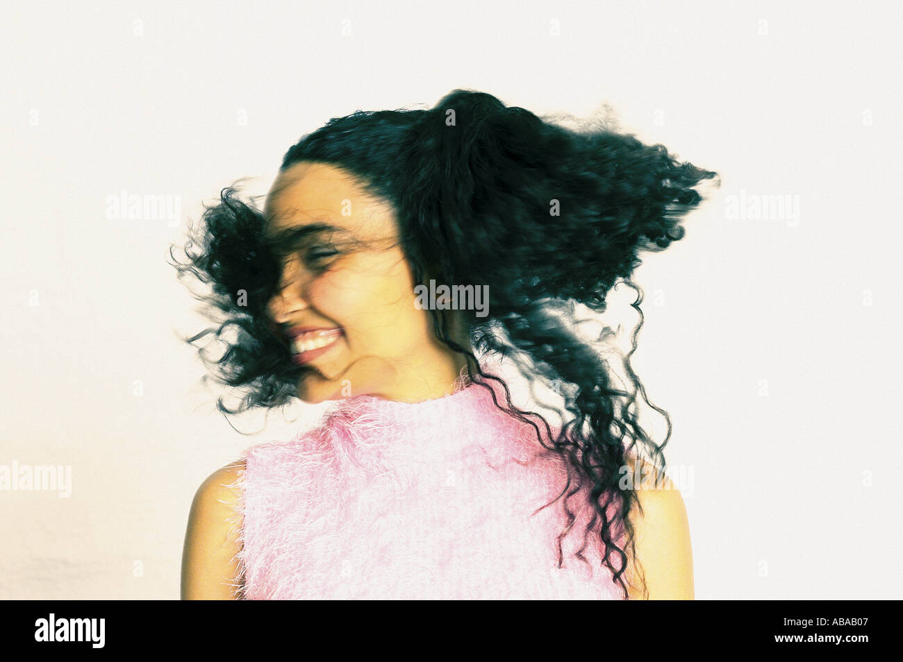 Woman turning head Stock Photo - Alamy