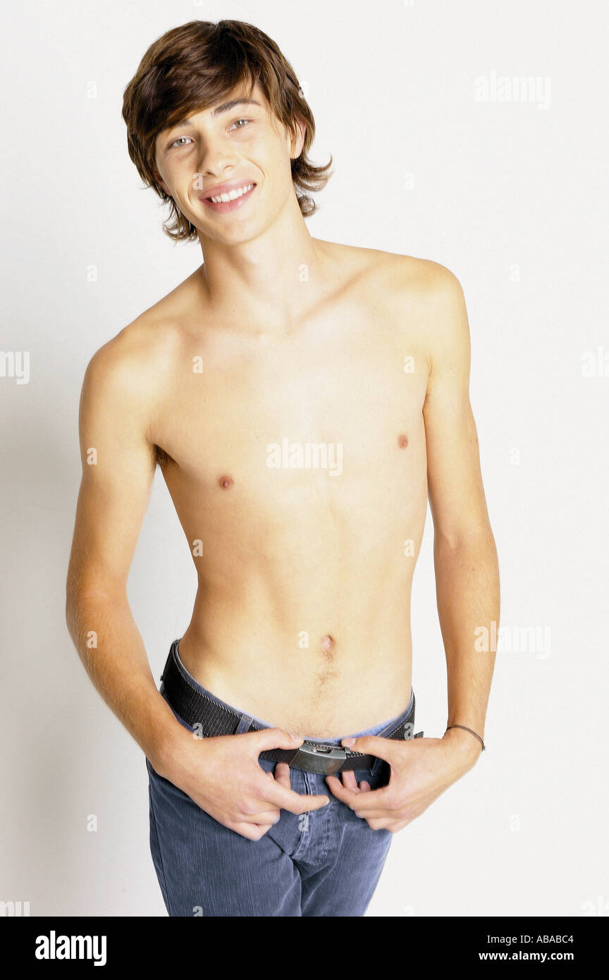 Man standing bare-chested Stock Photo - Alamy