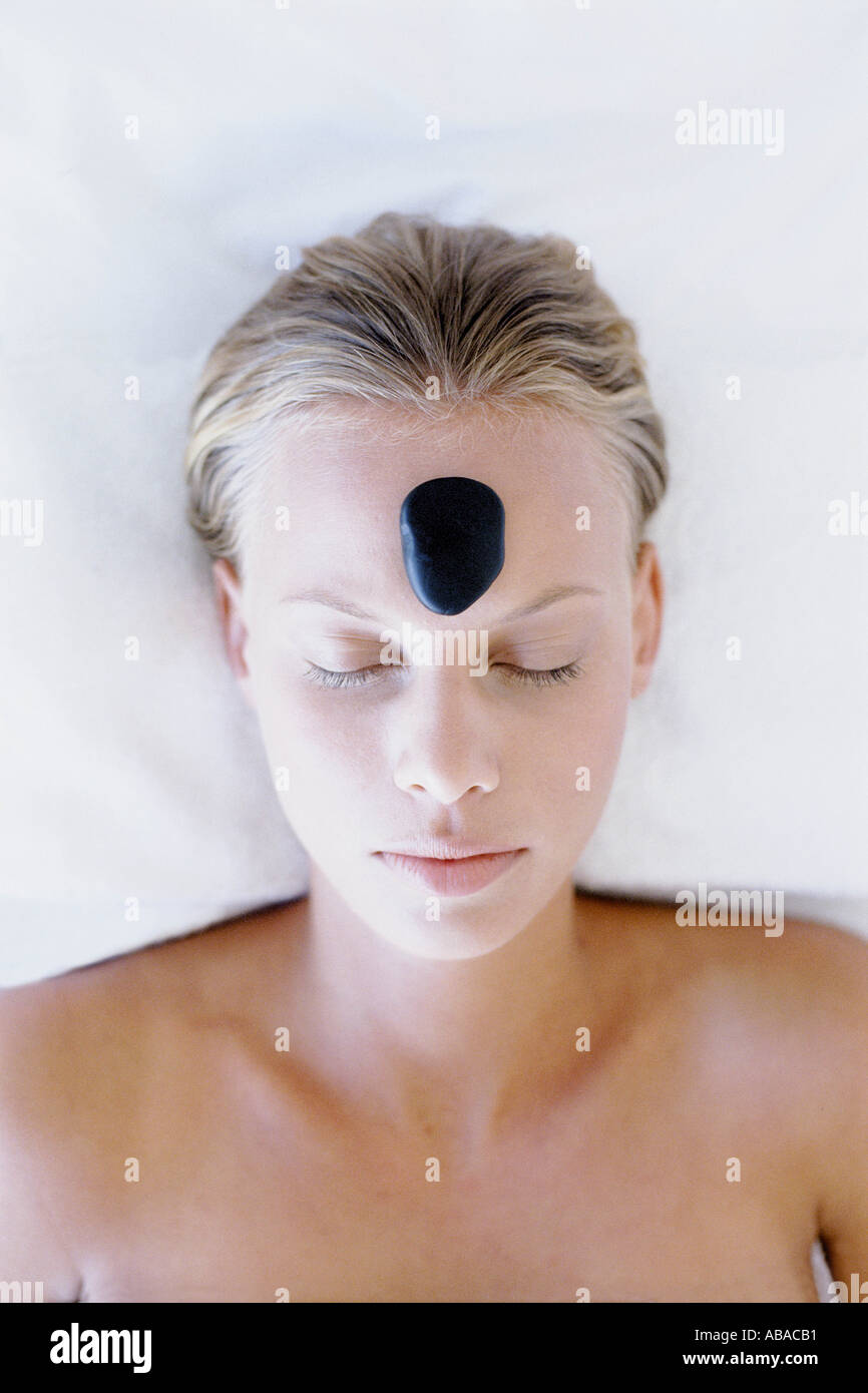 Woman receiving hot rock hi-res stock photography and images - Alamy