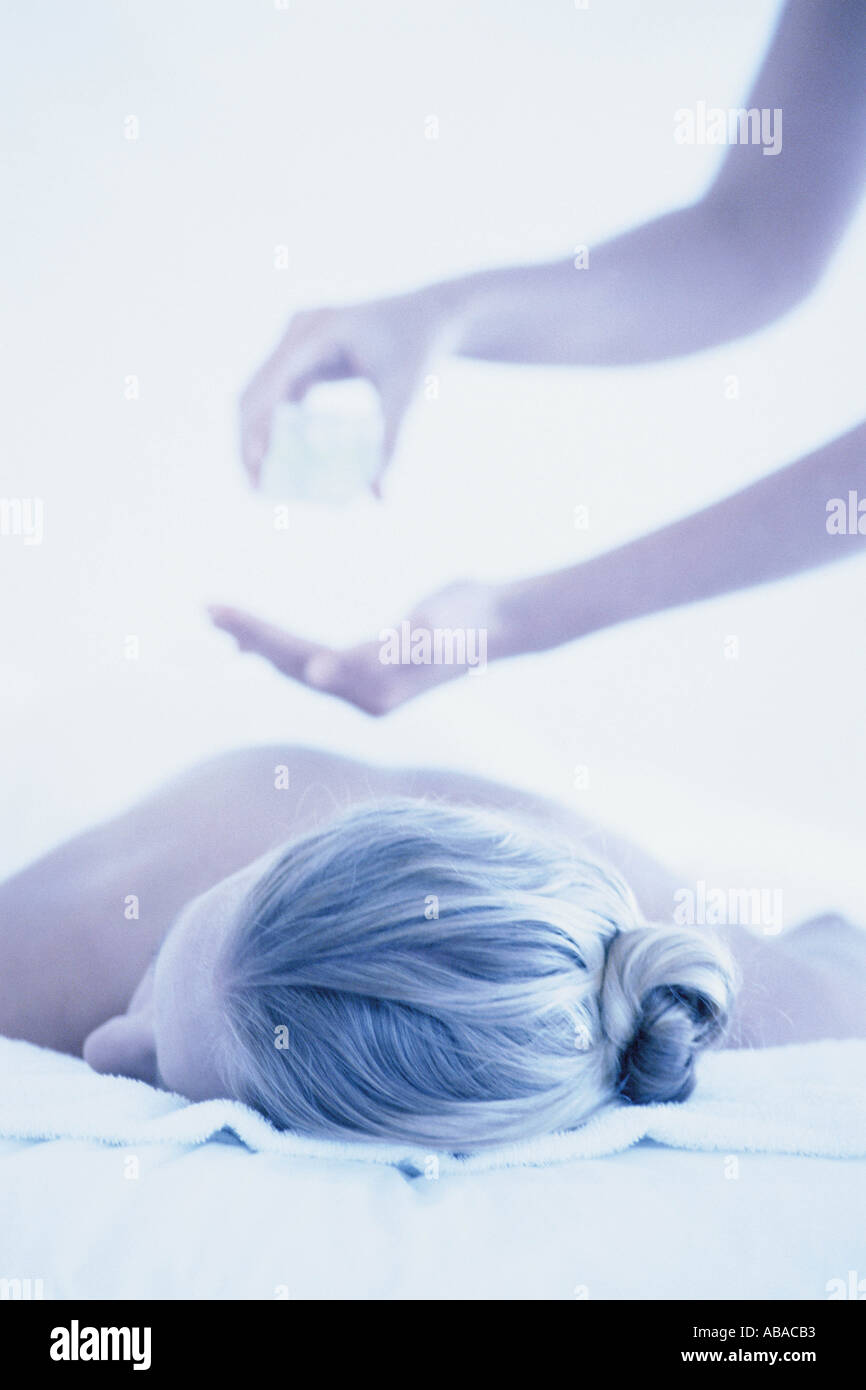 Woman receiving back treatment Stock Photo - Alamy