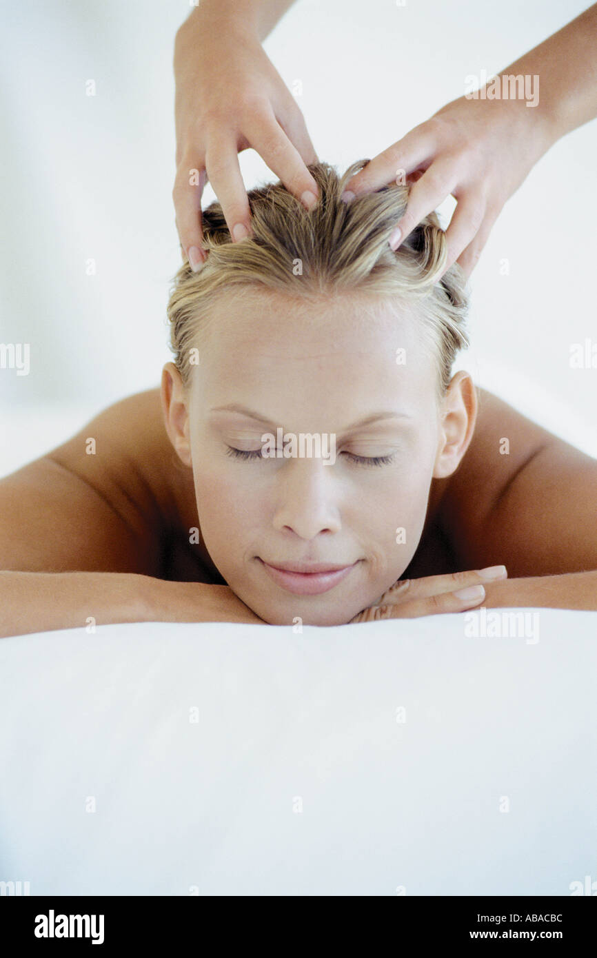 Woman receiving head massage Stock Photo - Alamy