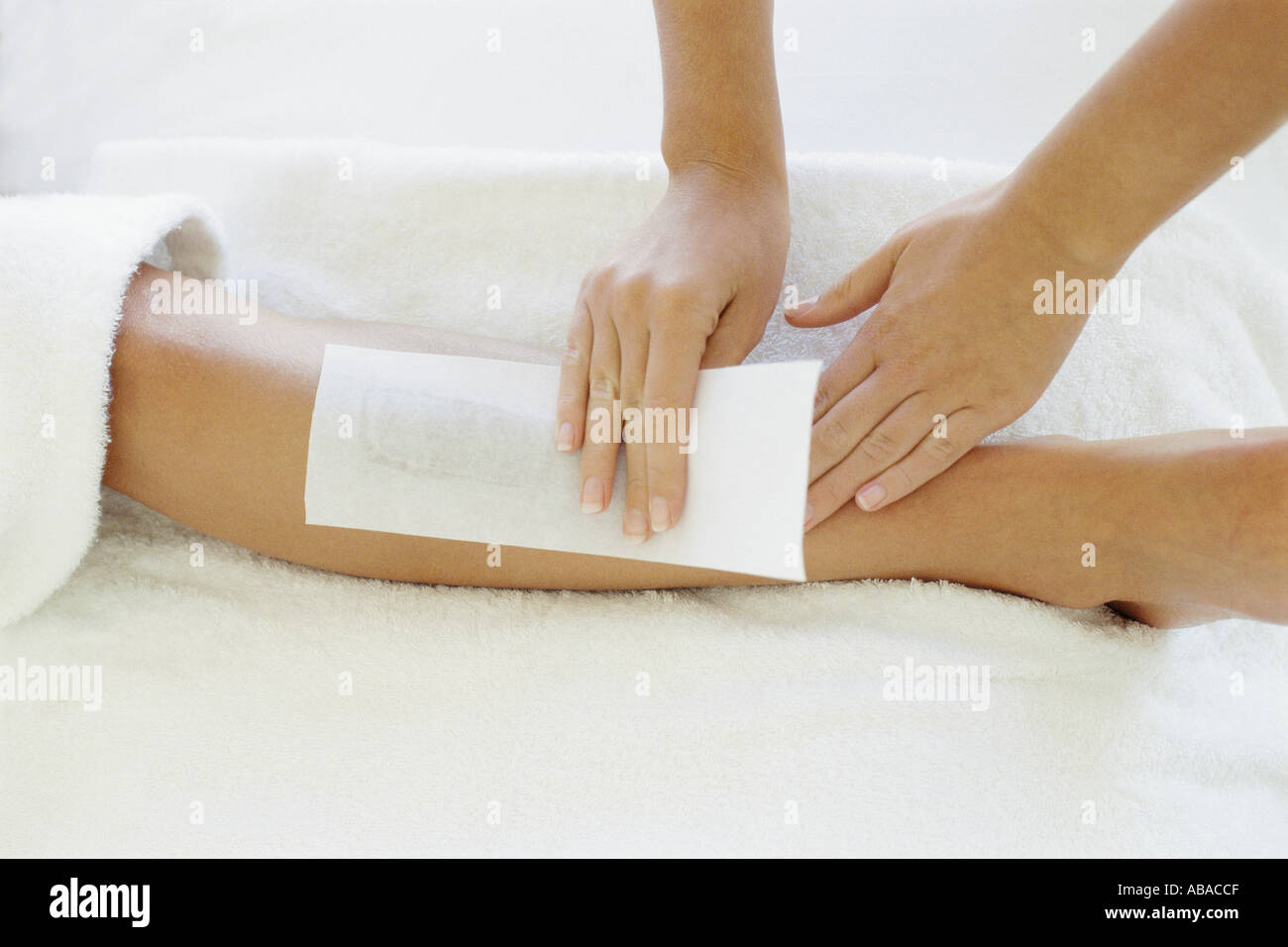Woman being waxed Stock Photo - Alamy