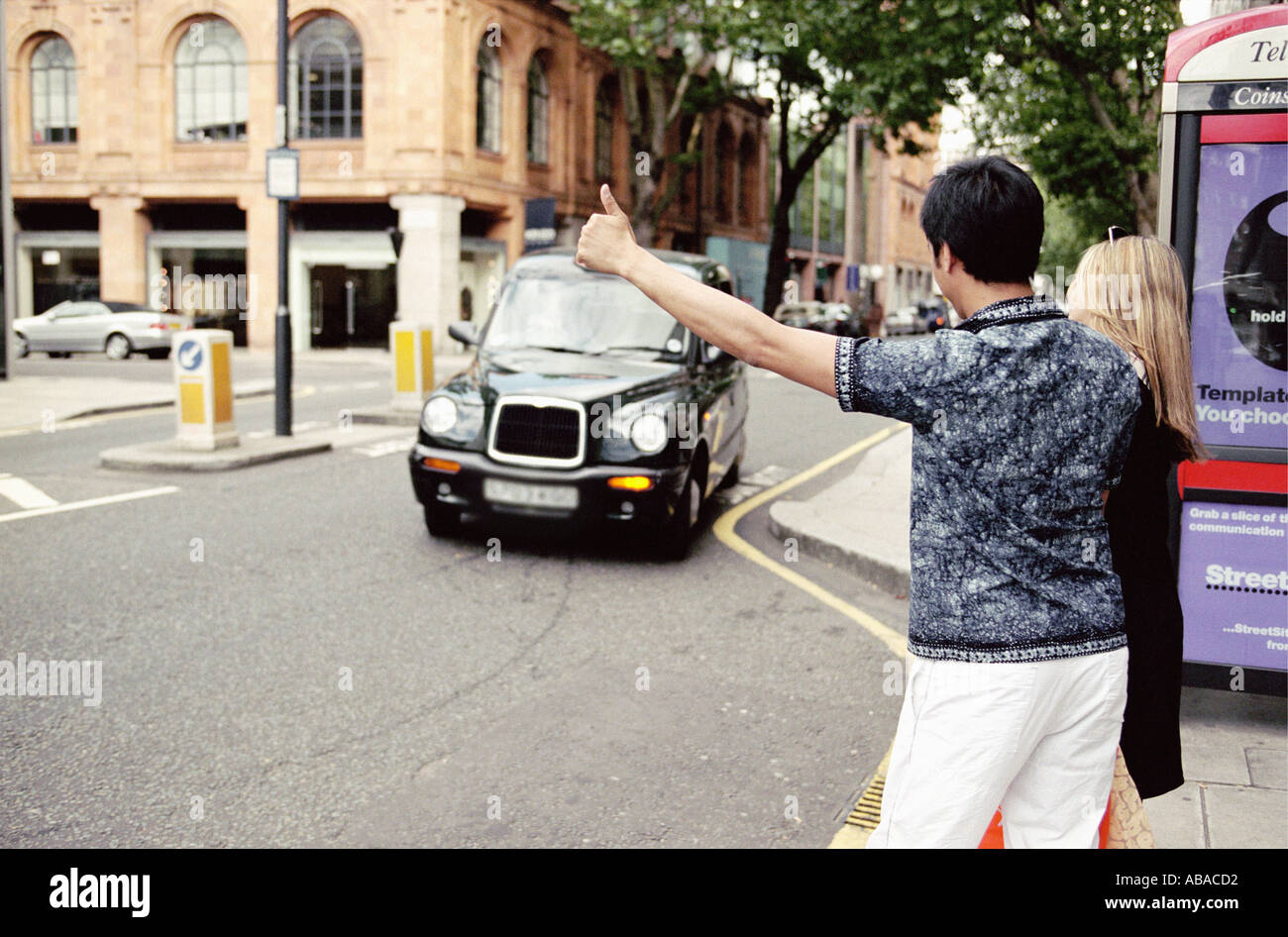Hailing cab london hi-res stock photography and images - Alamy