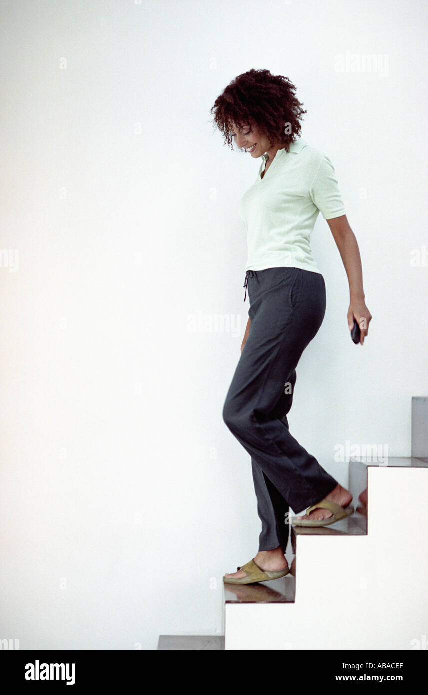 Woman Descending Stairs High Resolution Stock Photography and Images - Alamy