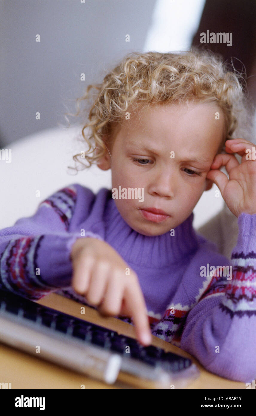 Girl at computer Stock Photo - Alamy