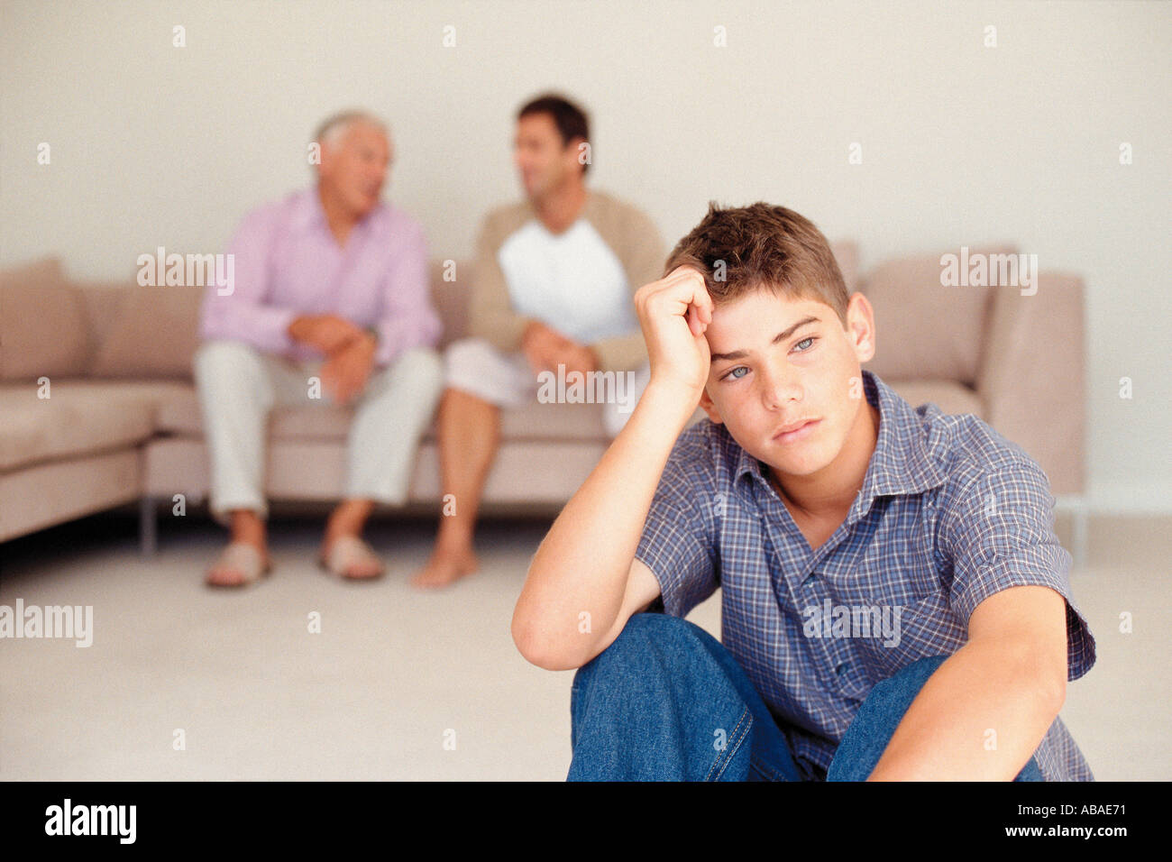 Bored teenage boy Stock Photo - Alamy