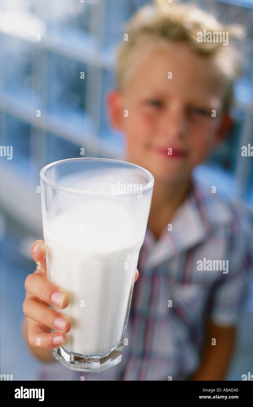 Boy with glass of milk Stock Photo - Alamy