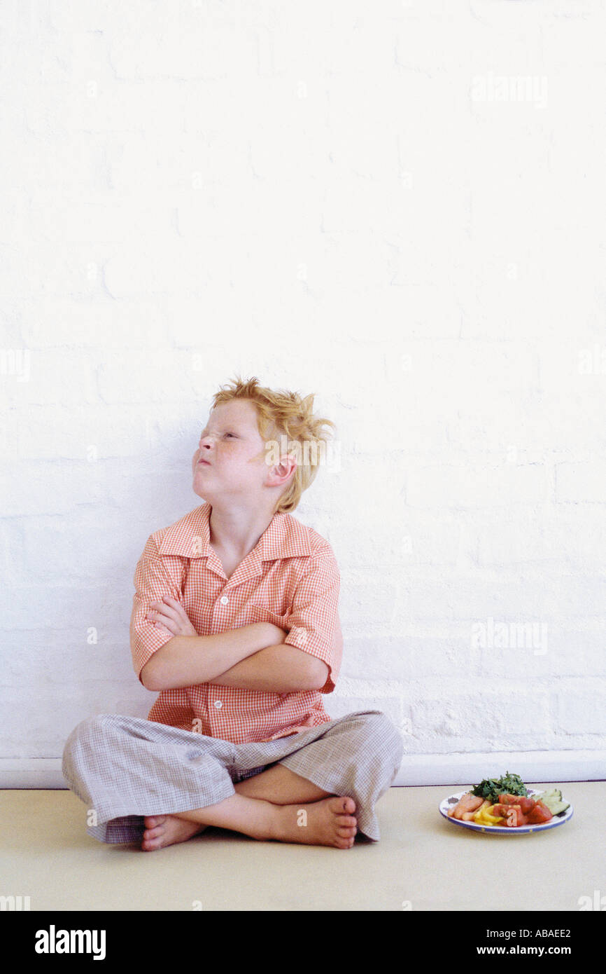 Boy refusing his food Stock Photo - Alamy