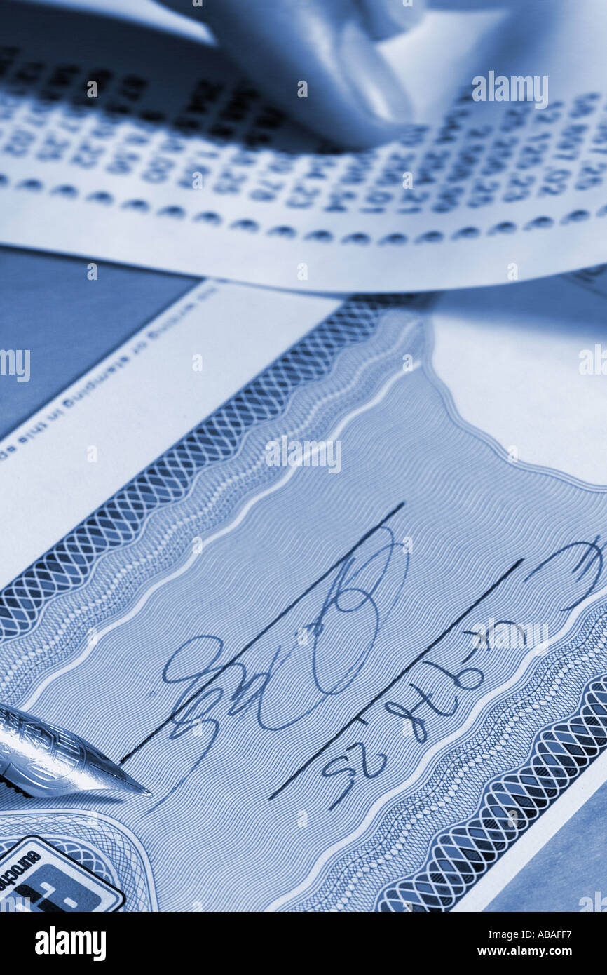 Signing a cheque Stock Photo - Alamy