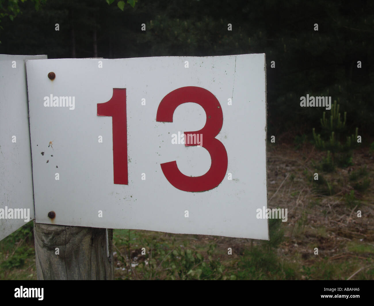 Sign with number thirteen in red Stock Photo - Alamy