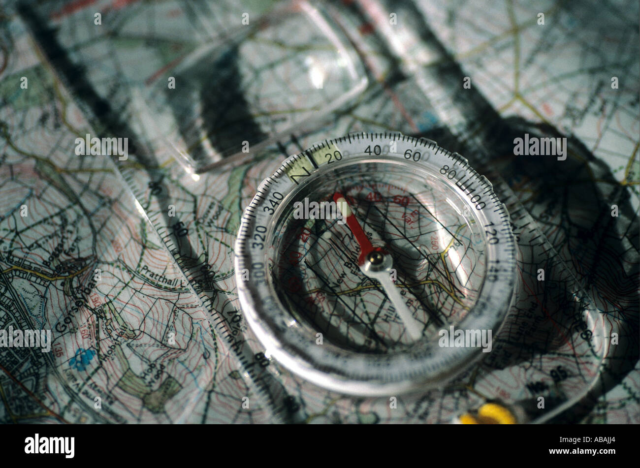 Compass and Map Stock Photo - Alamy